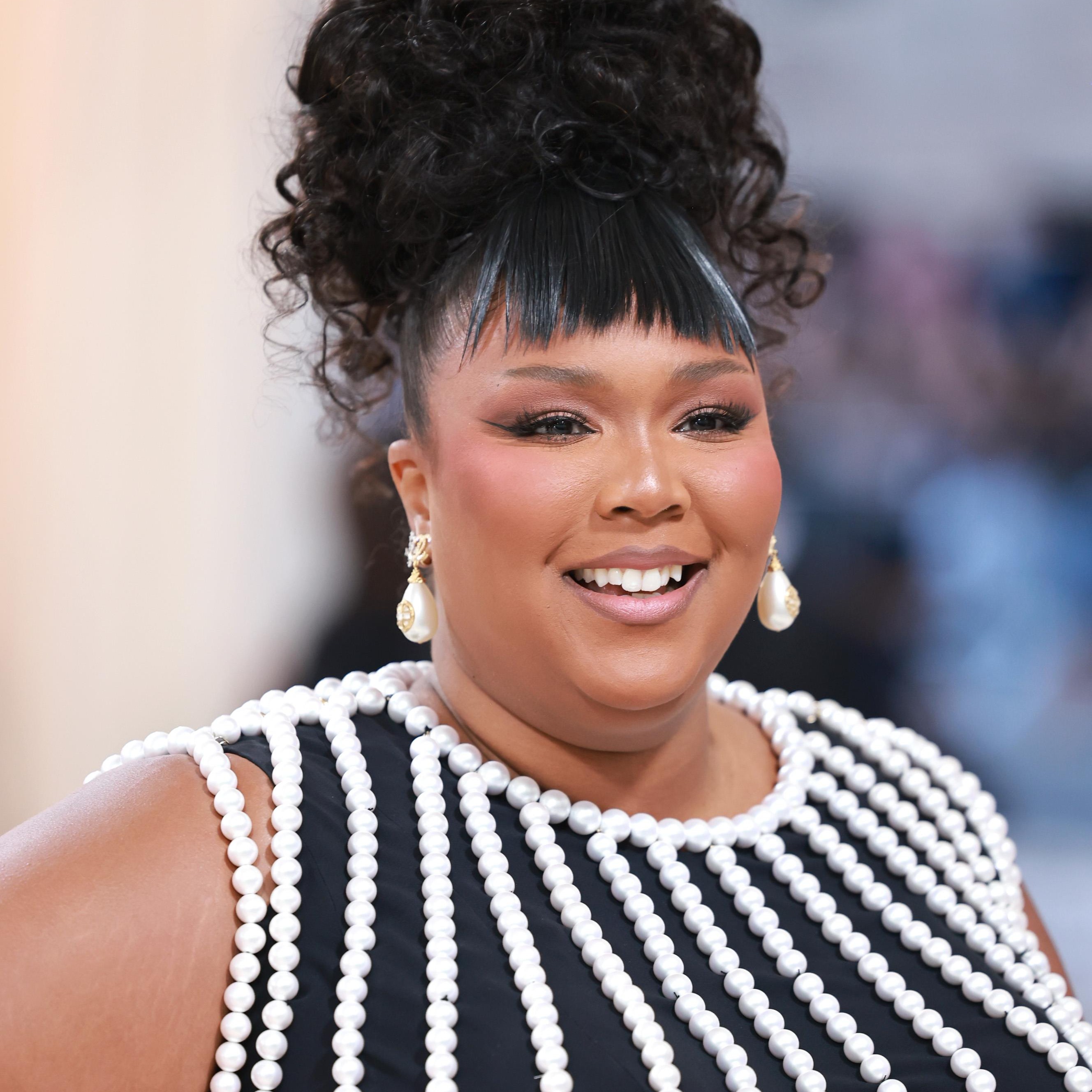 Lizzo Says She Doesn't Exercise To "Escape Fatness": "I Don't Look At ...