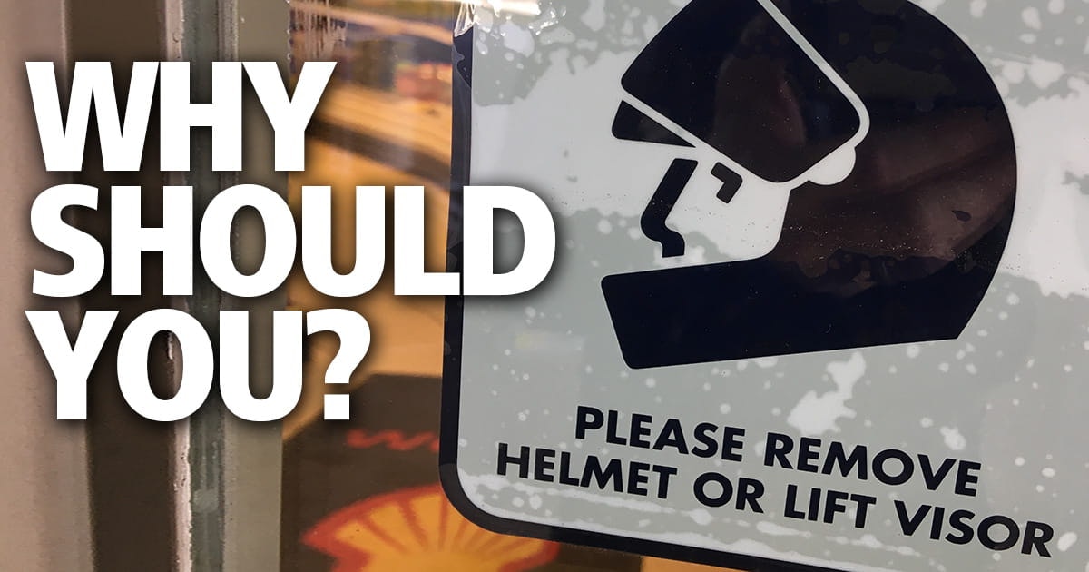 Why do some petrol stations make you take your helmet off?