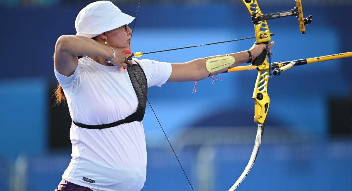 Olympic archer competes while 6 months pregnant: ‘Fighting together ...