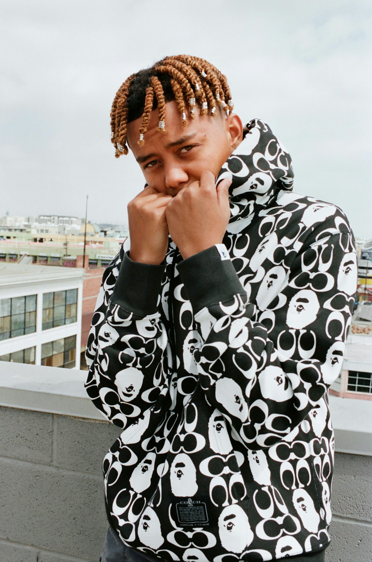 L'O Exclusive: Rapper Cordae Stars in New Bape X Coach Campaign ...