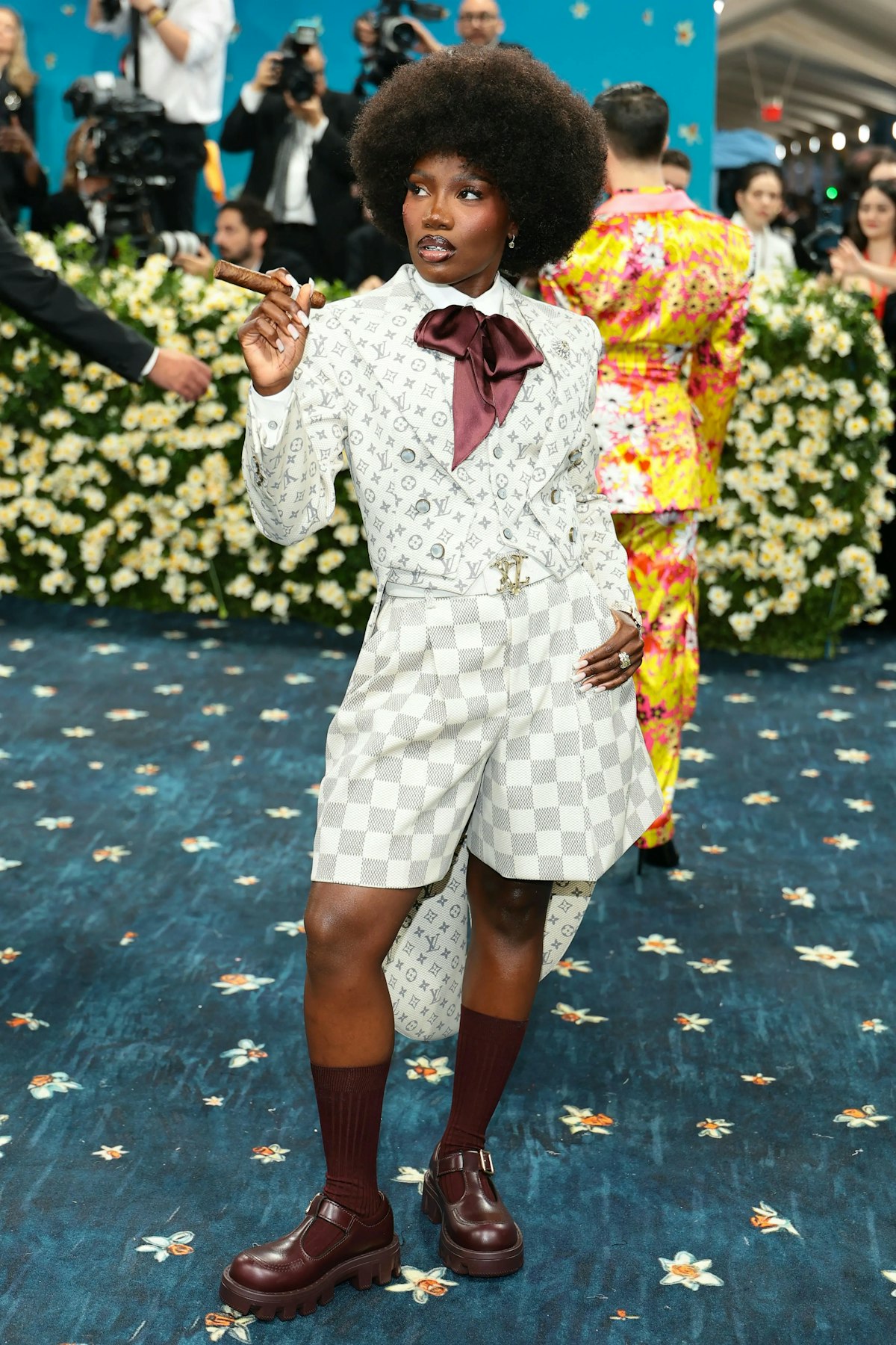 Doechii Wears a Louis Vuitton Logomania Suit to the 2025 Met Gala With Perfect Afro