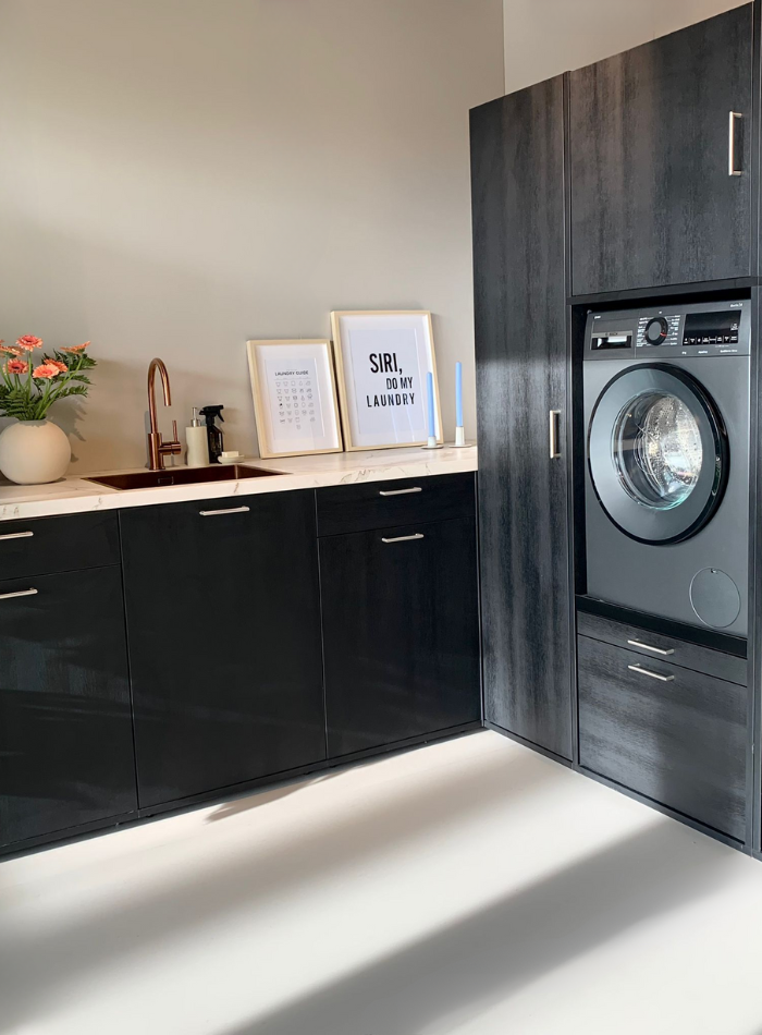 Why do people in the UK typically have their washing machine in the ...