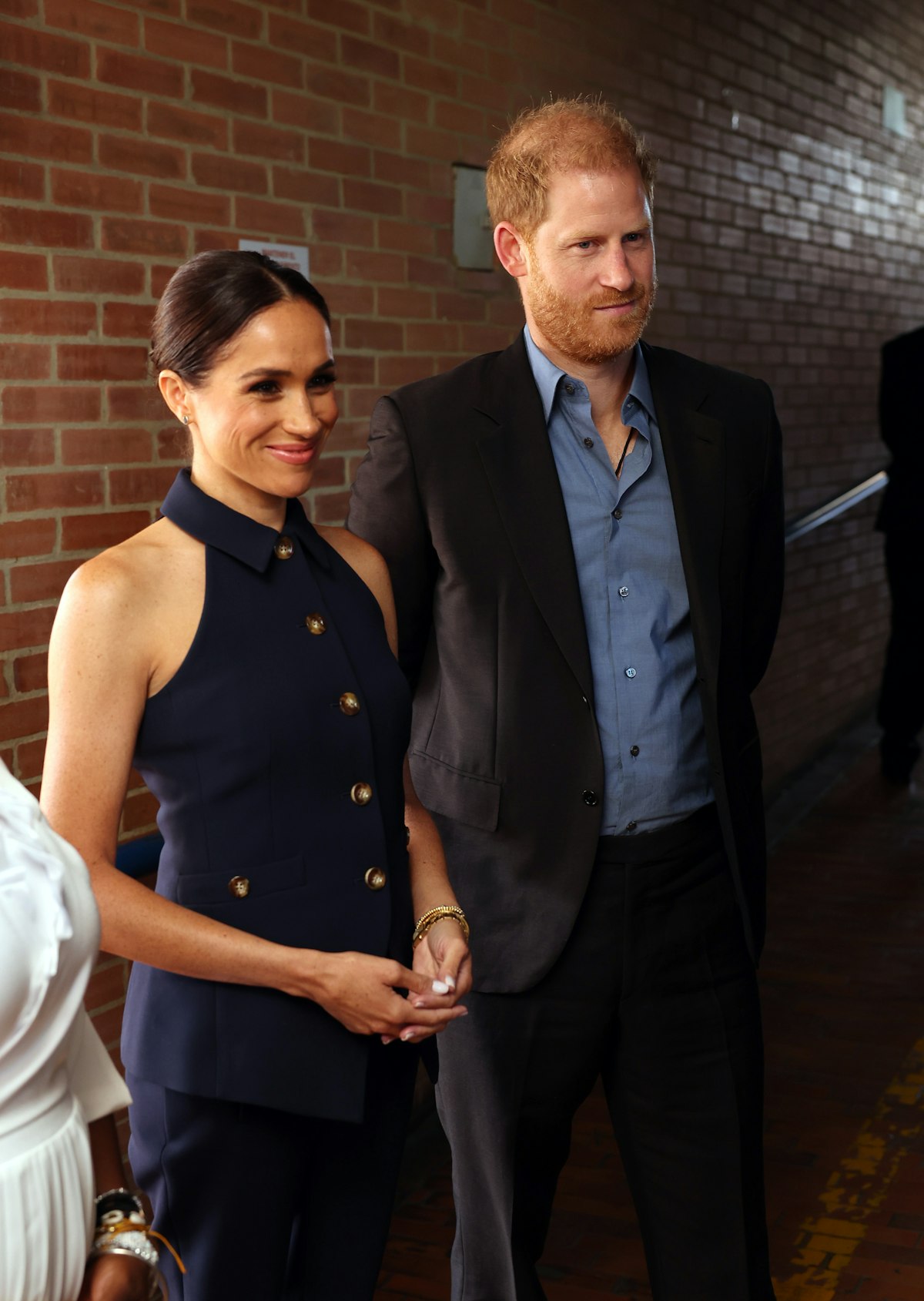Meghan Markle Opts for Monochrome Looks for Columbia Tour With Prince Harry