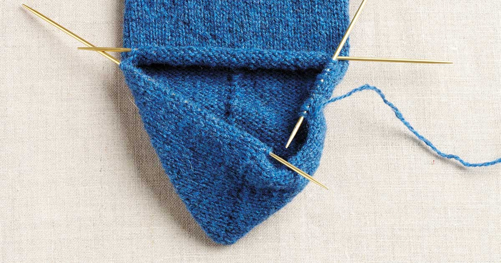 Re-Creating Knitted Stockings with a Common Heel | PieceWork