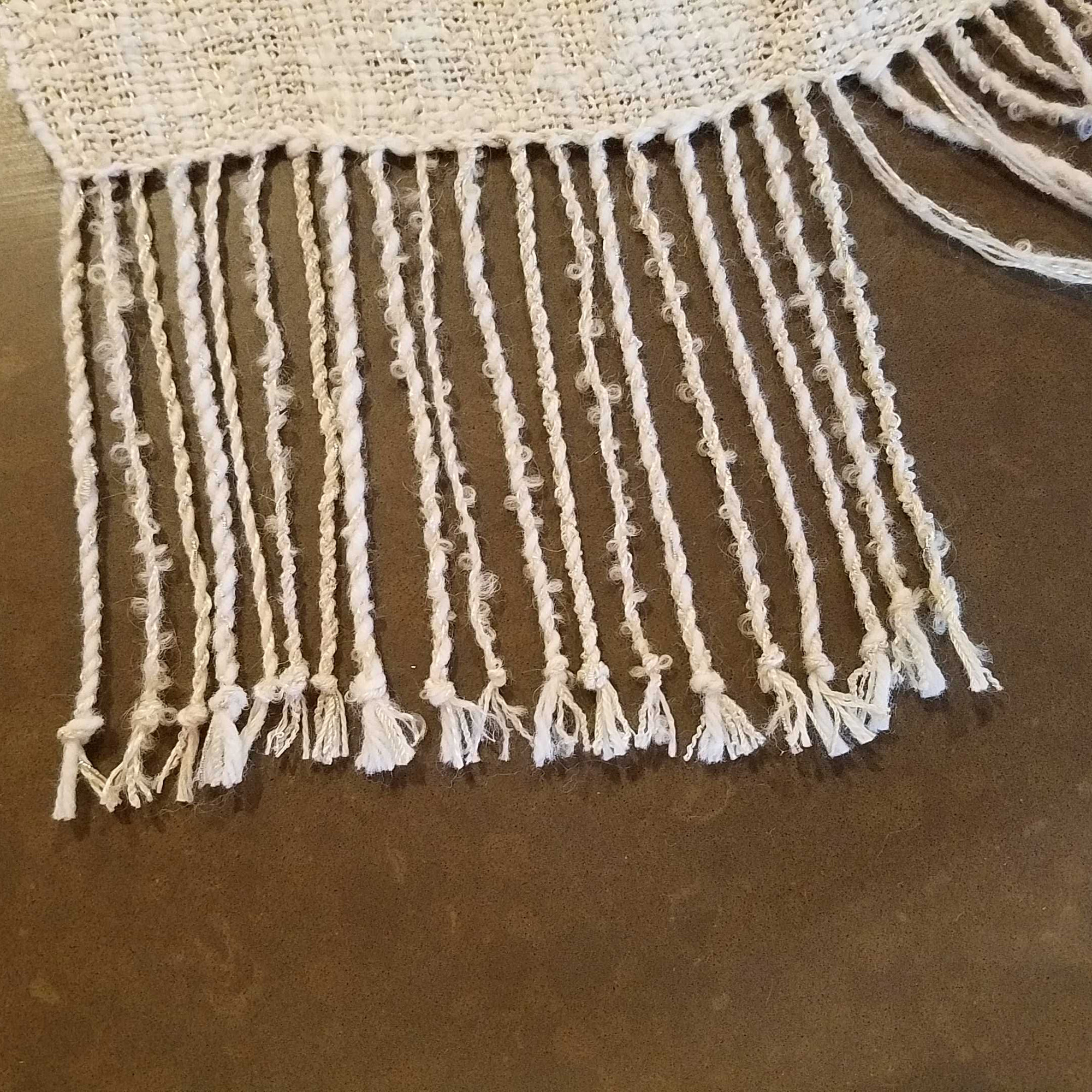 Twisting Fringe on a Mixed-Warp Shawl | Handwoven